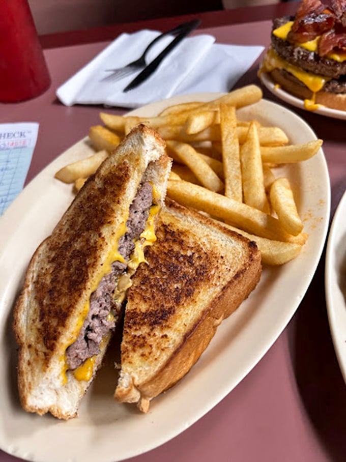 The patty melt: where burger meets grilled cheese in a harmonious union that makes you wonder why all relationships can't be this satisfying. 