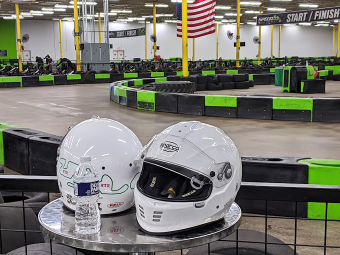 Racing helmets that have seen countless victory laps and crushing defeats. Each one holds stories of glory, near-misses, and "I almost had you" moments.