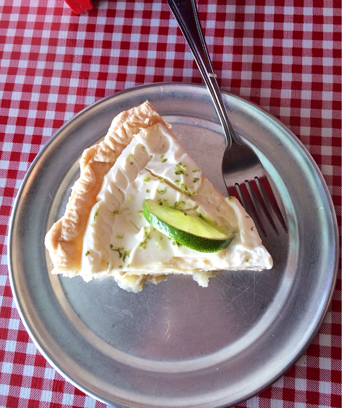 Key lime pie that transports you straight to Florida without the humidity. That perfect slice with its lime garnish is vacation on a plate.