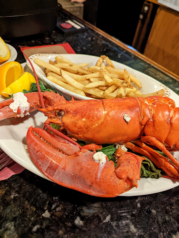 The classic lobster and fries combo&mdash;proof that simplicity often yields perfection. That claw is practically waving "eat me first!"