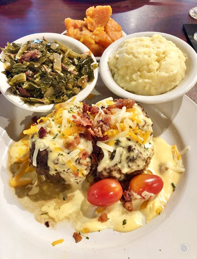 The holy trinity of Southern sides&mdash;collards, mashed potatoes, and cornbread&mdash;flanking meatloaf that's dressed for success with cheese and bacon confetti.