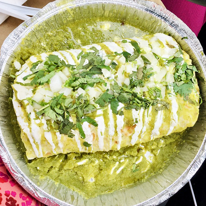 This take-out burrito doesn't just travel well &ndash; it arrives like a gift, wrapped in aluminum and topped with fresh cilantro and onion confetti.