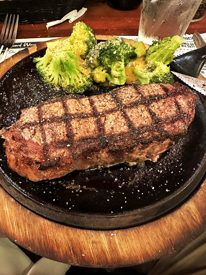 Perfect grill marks aren't just decoration&mdash;they're a steakhouse's signature, telling you this kitchen understands the sacred contract between cow and carnivore.