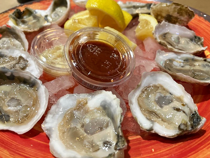 The ocean's perfect appetizer—fresh oysters on ice with a squeeze of lemon. Like kissing the sea, only with cocktail sauce.