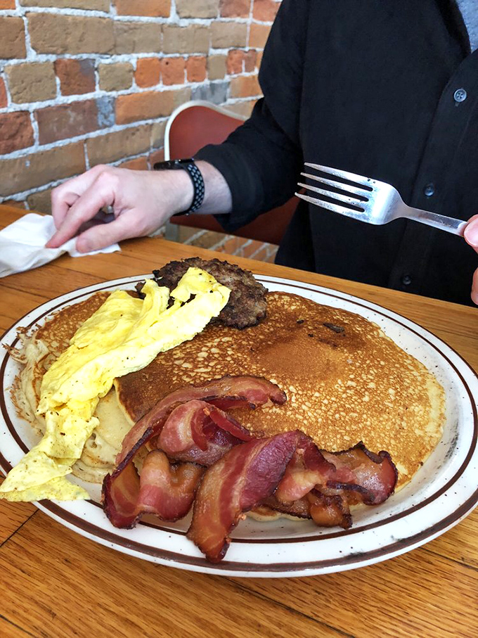 This isn't just breakfast&mdash;it's a negotiation between pancake, egg, and bacon for who gets to make you happiest first.