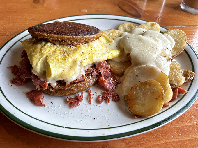 The breakfast sandwich that launched a thousand road trips. Corned beef hash peeks out mischievously, daring you not to order it next time.
