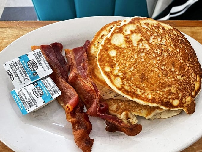 Golden pancakes and perfectly crisped bacon&mdash;the breakfast equivalent of Dolly Parton and Kenny Rogers, a duo that never disappoints. 