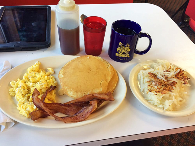 Pancake perfection doesn't need to be complicated. Golden, fluffy discs alongside eggs and bacon&mdash;the breakfast trinity that never disappoints.