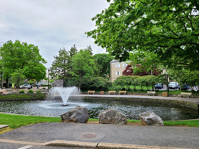 Lititz Springs Park's fountain creates a serene centerpiece where locals gather, proving that some of life's best moments happen when water dances in sunlight.