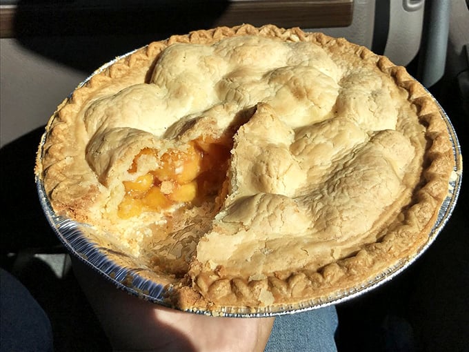 Peek inside this golden-crusted peach pie and you'll understand why some people plan entire road trips around bakery destinations.