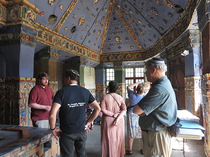 Tour guides reveal the castle's secrets while visitors crane their necks upward, experiencing what I call "Sistine Chapel Neck" – worth every twinge.