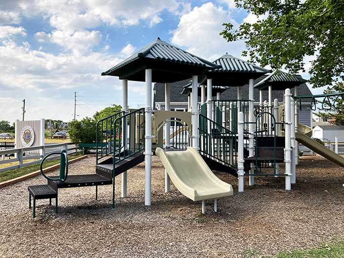 Even the playground equipment in Dewey knows the dress code—nautical-themed slides where kids can burn off ice cream energy before parents' afternoon naps.