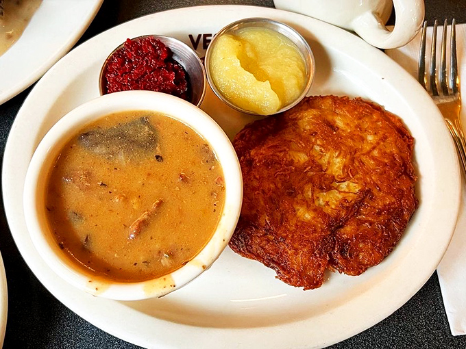 This isn't just soup and a potato pancake&mdash;it's liquid sunshine paired with a crispy-edged disc of potato perfection that would make any grandmother proud.