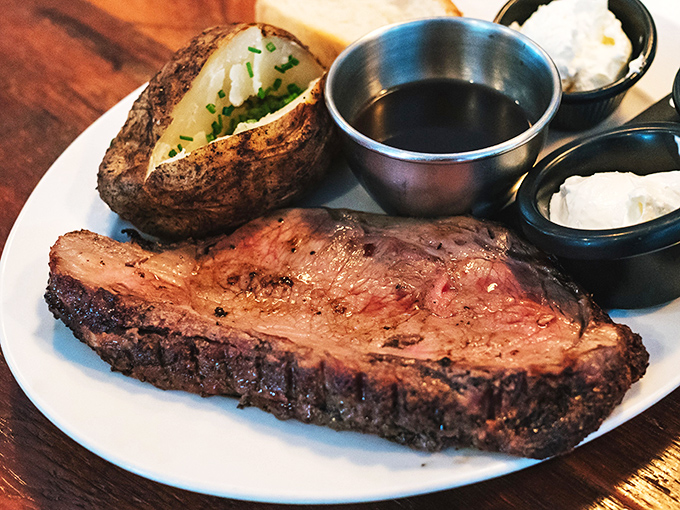 This isn't just meat; it's a time-honored ritual. Prime rib cooked to blushing perfection with jus so flavorful you'll contemplate drinking it straight.