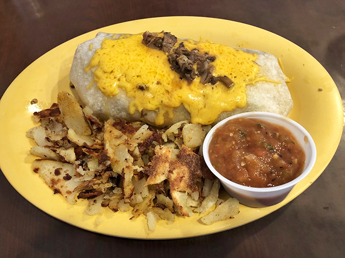 The breakfast burrito at The Stove isn't messing around&mdash;cheese-smothered, potato-packed, and served with salsa that'll wake you up faster than three cups of coffee.
