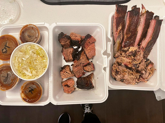 Pulled pork so tender it looks like it was coaxed apart by sweet nothings rather than forks. The bark bits mixed throughout are like finding treasure in every bite.