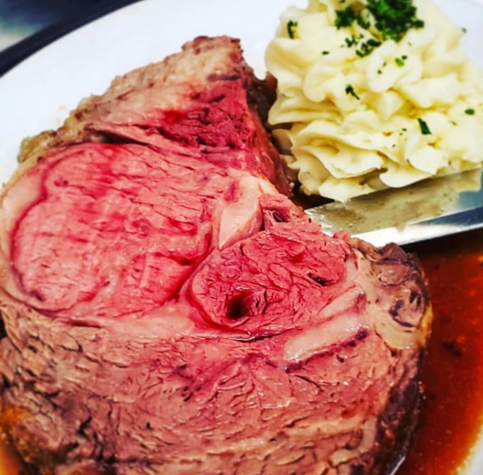 Behold the star of the show – prime rib so perfectly cooked it makes you wonder if the chef has some sort of meat telepathy.