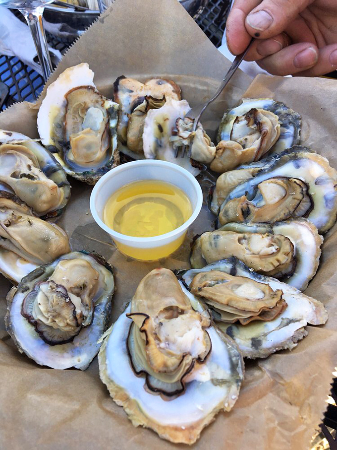Roasted oysters that make you question why you ever ate them any other way. The butter-kissed bivalves glisten like they're winking at you, saying "You're welcome."