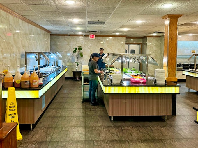 The salad bar: that obligatory nod to healthfulness before the seafood marathon begins. Green means go... back for more crab legs.