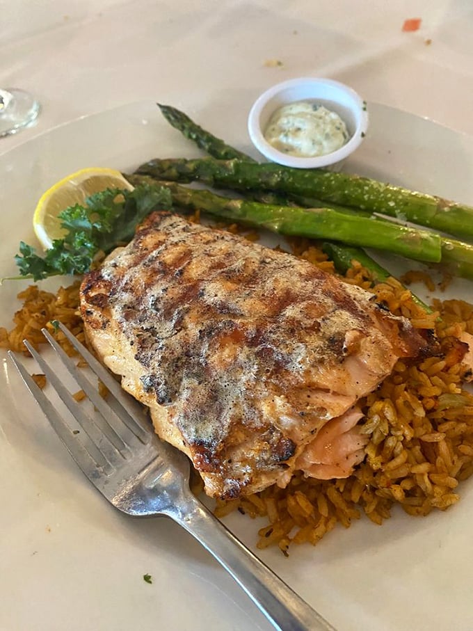 A perfectly grilled salmon that doesn't need fancy tricks&mdash;just asparagus standing at attention and rice pilaf ready to soak up every last flavor.