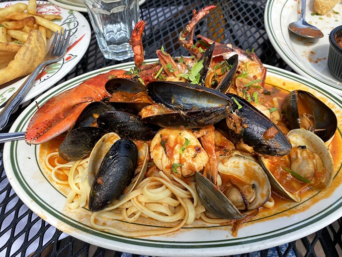 This seafood pasta isn't just a meal, it's a Mediterranean vacation, with mussels and shrimp playing Marco Polo in a tomato broth sea.