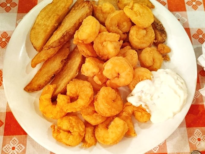 These fried shrimp aren't just food; they're little life preservers in a sea of ordinary dining experiences. Crispy perfection with zero pretension.