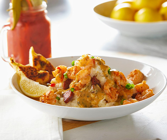 This isn't just shrimp and grits; it's a Southern symphony in a bowl, with each spoonful telling a delicious bayou story.