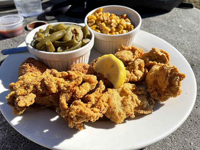 The supporting cast deserves its own standing ovation&mdash;crispy fried clams with green beans and corn that would make any Southern grandma proud.