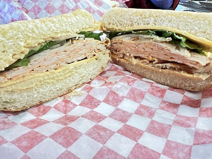 Two sandwiches, one checkered paper &ndash; a deli duet that proves Virginia knows its way around meat and bread combinations.