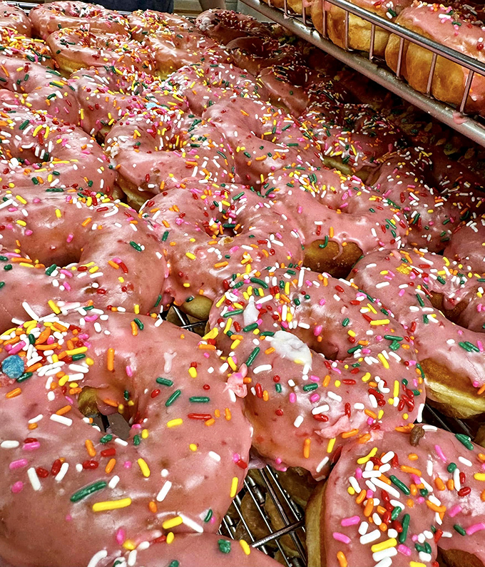 Pink-glazed donuts with rainbow sprinkles prove that sometimes the most joyful foods are the ones that tap into our childhood memories.