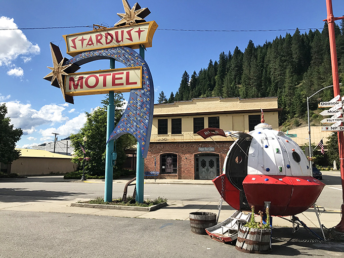 The Stardust Motel sign glows with mid-century optimism, while that ladybug-shaped... whatever that is... adds just the right touch of small-town whimsy.