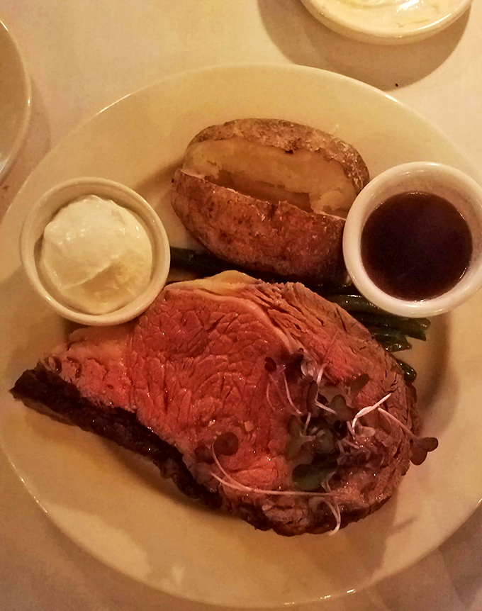 The kind of prime rib that makes conversation stop mid-sentence. Notice how the horseradish sauce stands ready for its big moment.