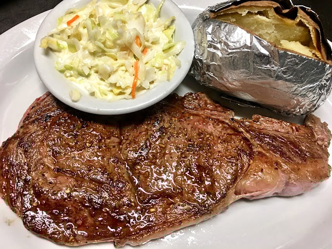 This isn't just a steak; it's a masterclass in simplicity. Perfectly seared, served with a loaded potato that could be a meal itself. 