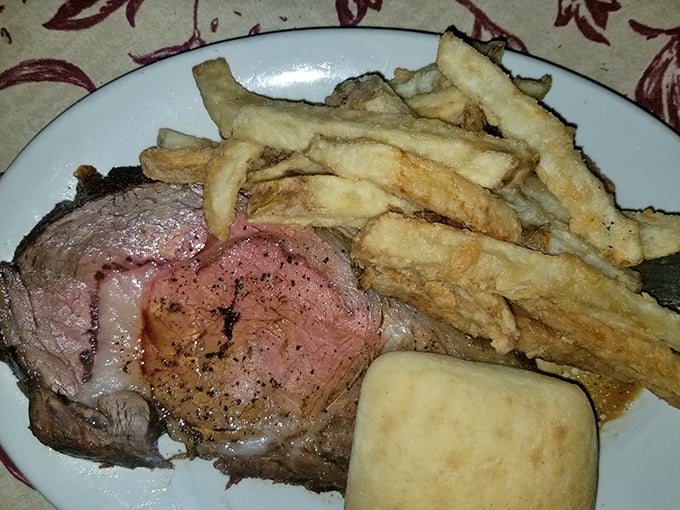 When steak and fries unite in rustic harmony, time stops. This plate doesn't need Instagram filters—it's influencer-worthy in its natural state.