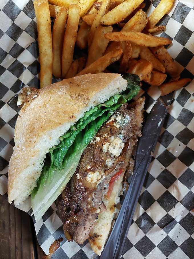 The sausage sandwich doesn't just satisfy hunger&mdash;it obliterates it. Caramelized onions and golden fries make this a roadtrip revelation.