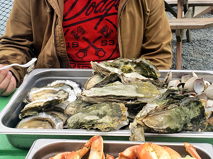 A seafood feast fit for Neptune himself&mdash;freshly shucked oysters and local catch arranged with the casual elegance of coastal dining.