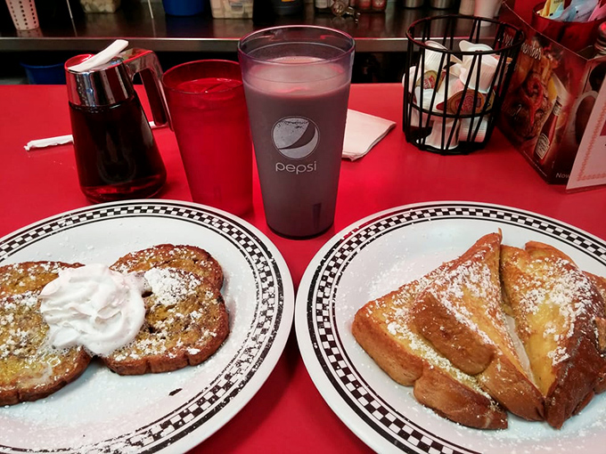 French toast that's achieved golden perfection, paired with what appears to be chocolate milk&mdash;because being an adult means breakfast dessert is acceptable.