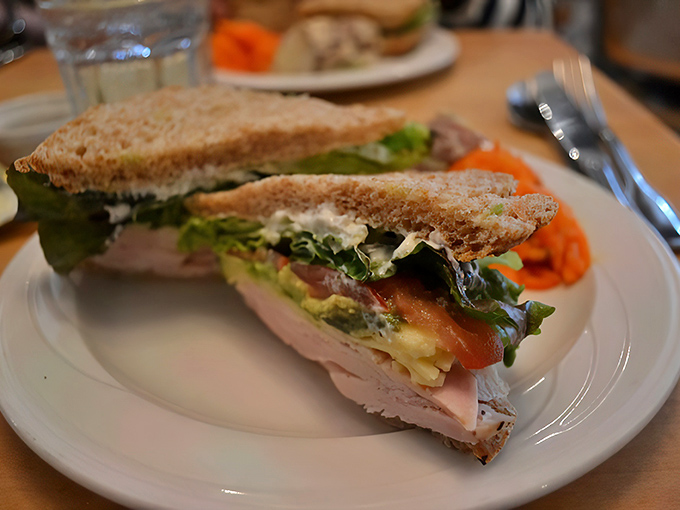 This isn't just a turkey sandwich&mdash;it's architecture with avocado, crisp lettuce, and tomato between perfectly toasted bread.