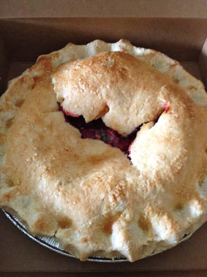 A pie with a perfect tan and a peek-a-boo center. Like a good novel, this strawberry rhubarb creation reveals just enough to keep you intrigued.