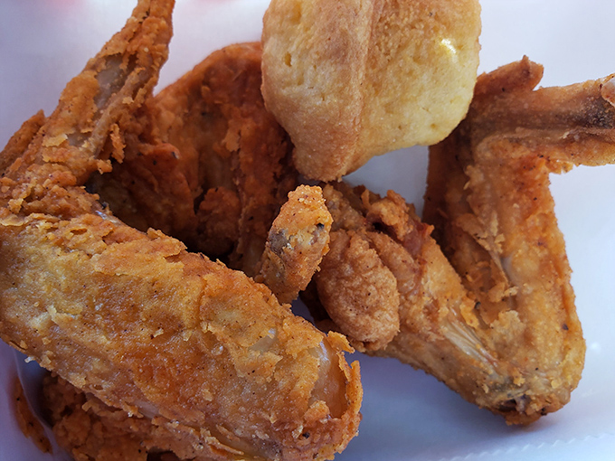 These wings aren't just fried, they're transformed—the kind that make you temporarily forget table manners exist.