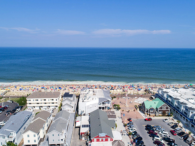 Bethany Beach from above&mdash;where colorful umbrellas dot the shoreline like sprinkles on nature's perfect sundae.