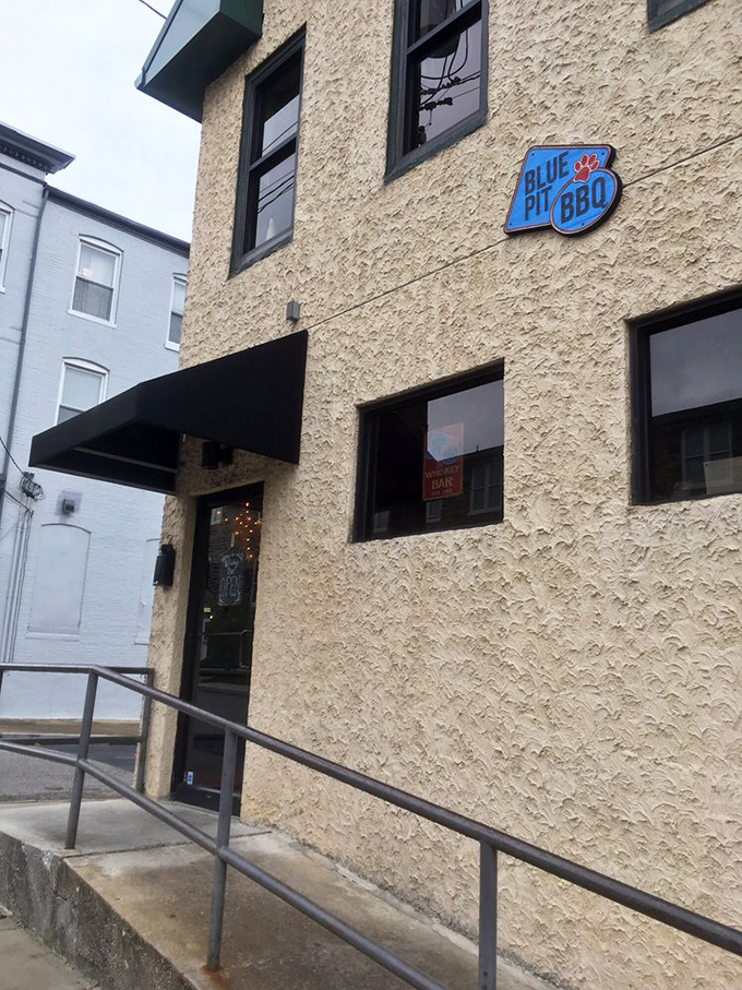 Blue Pit BBQ: That textured stone exterior isn't just historic charm &ndash; it's nature's way of containing explosive BBQ flavors.