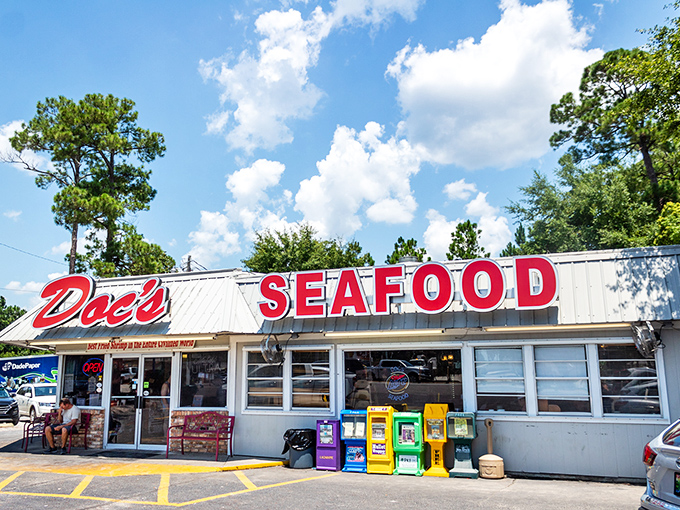 Doc's straightforward white building with bold red "SEAFOOD" lettering cuts through the noise like your no-nonsense aunt who makes the best holiday dinners.