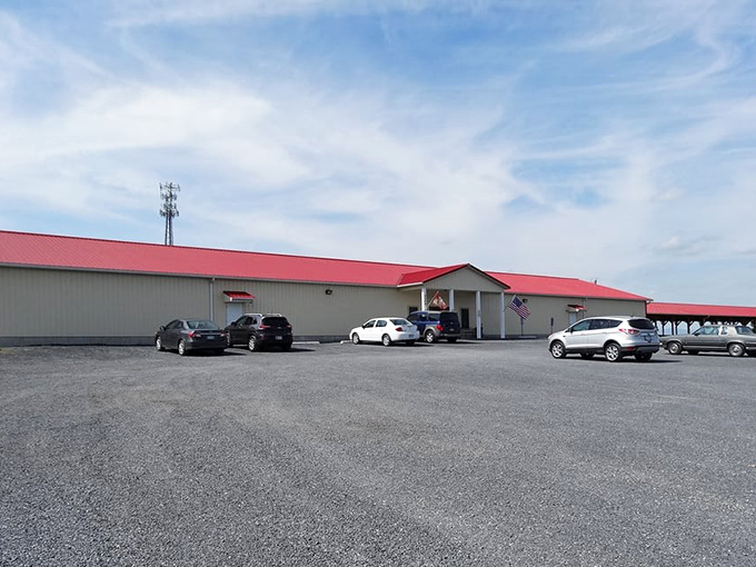 Shenandoah Flea Market's distinctive red roof &ndash; a retail lighthouse guiding bargain seekers through the Shenandoah Valley.