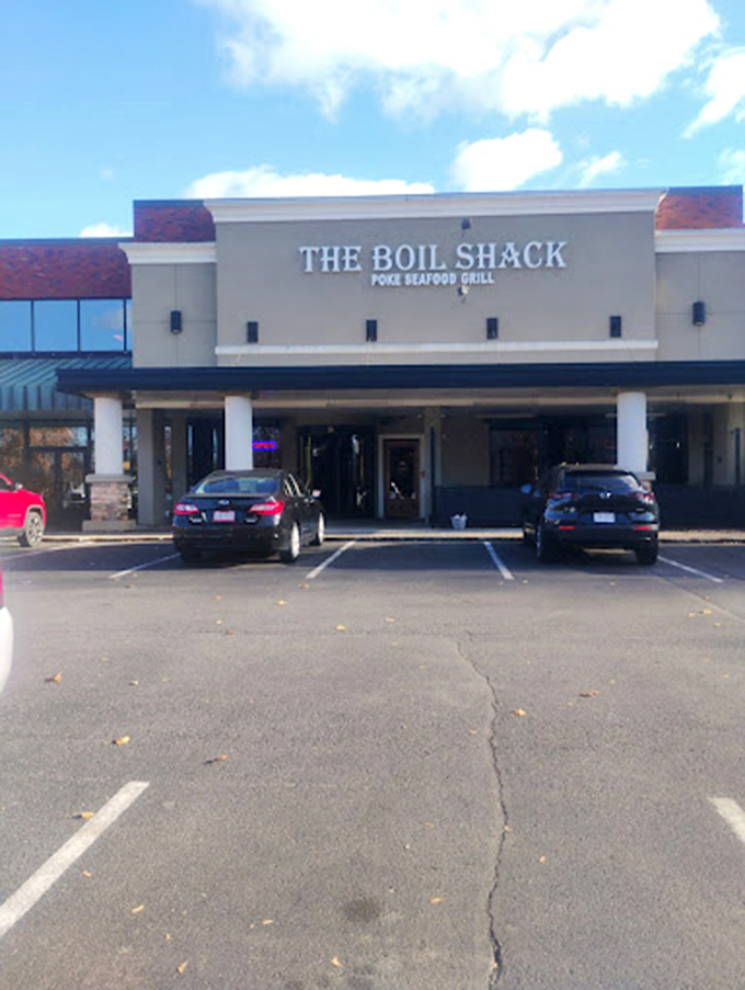 The Boil Shack: "Clean lines and simple signage hide the delicious chaos waiting inside. Get ready for a hands-on seafood experience that laughs at dignity."