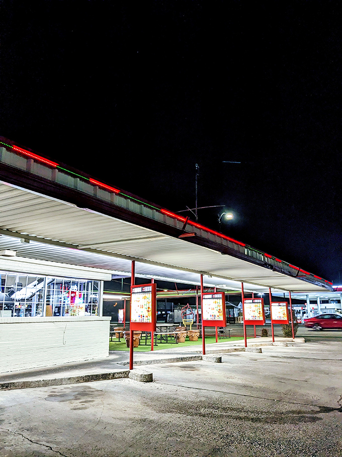 After dark, the Classic 50's transforms into a red-and-green-lit wonderland that makes every hot dog run feel like a special occasion.