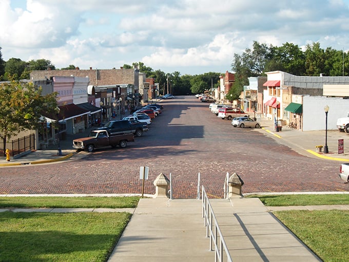 Brick streets lead the eye straight to Cottonwood Falls' crown jewel. This courthouse has been turning heads since the 1870s!