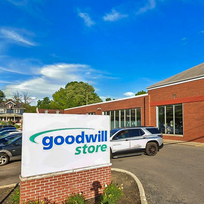 This unassuming Goodwill exterior hides a wonderland where designer labels mingle with everyday basics like guests at an unusually democratic cocktail party.