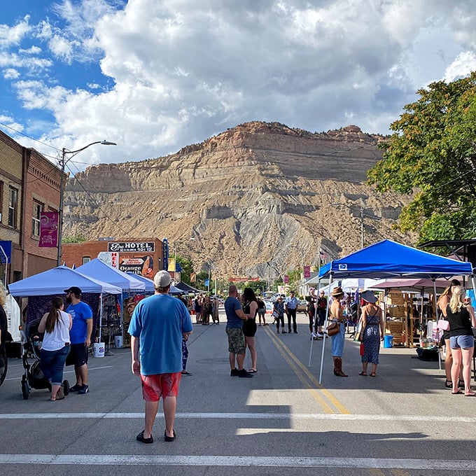 Downtown Helper during market day &ndash; where the dramatic Book Cliffs provide a natural stage curtain for small-town life.