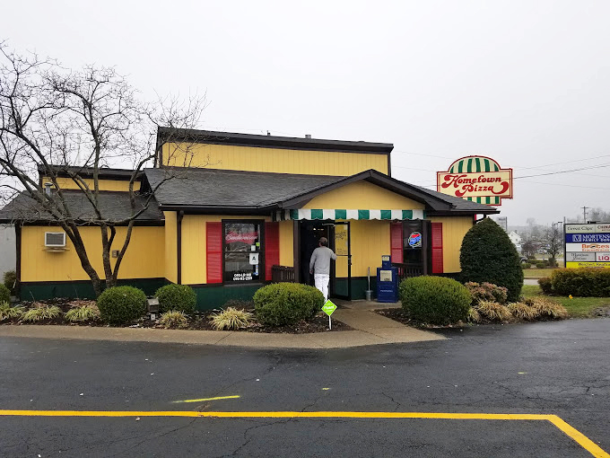 Those green-and-red awnings aren't just decorative&mdash;they're signaling the Italian magic happening inside.